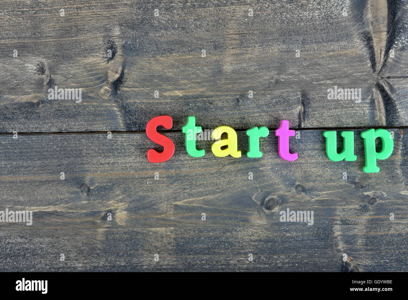 Start up word on wooden table Stock Photo - Alamy