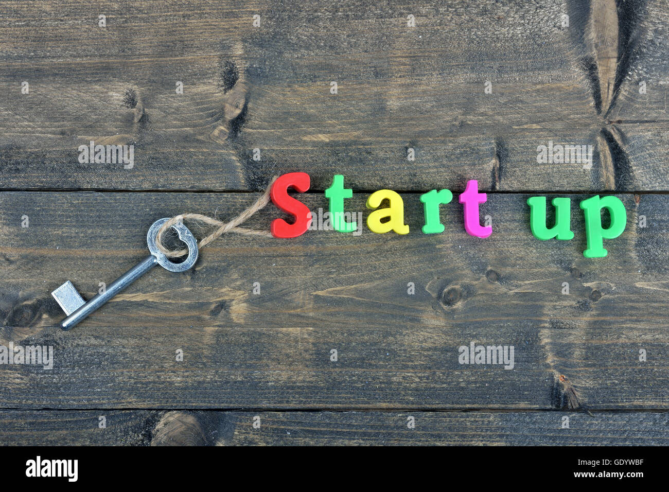 Start up word on wooden table Stock Photo - Alamy