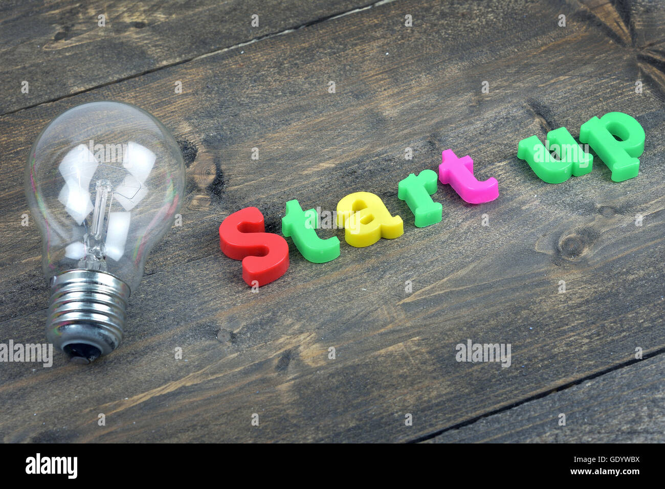 Start up word on wooden table Stock Photo - Alamy