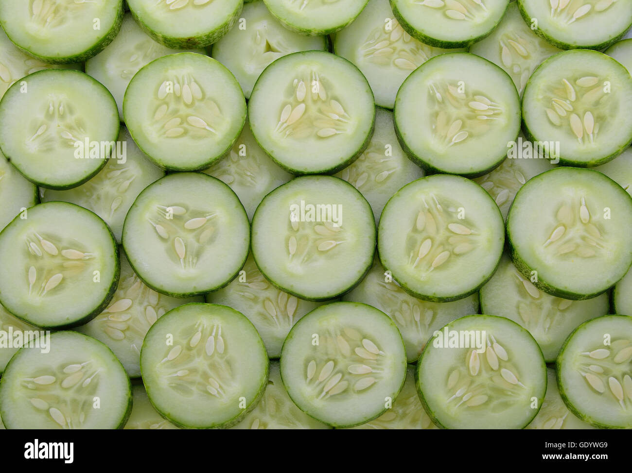 Close up of fresh cucumber slices background Stock Photo - Alamy