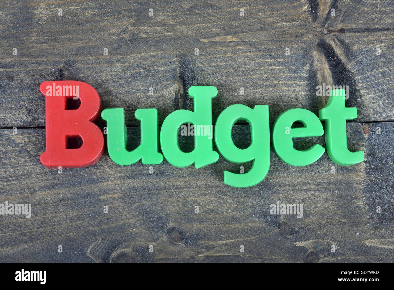 Budget word on wooden table Stock Photo - Alamy