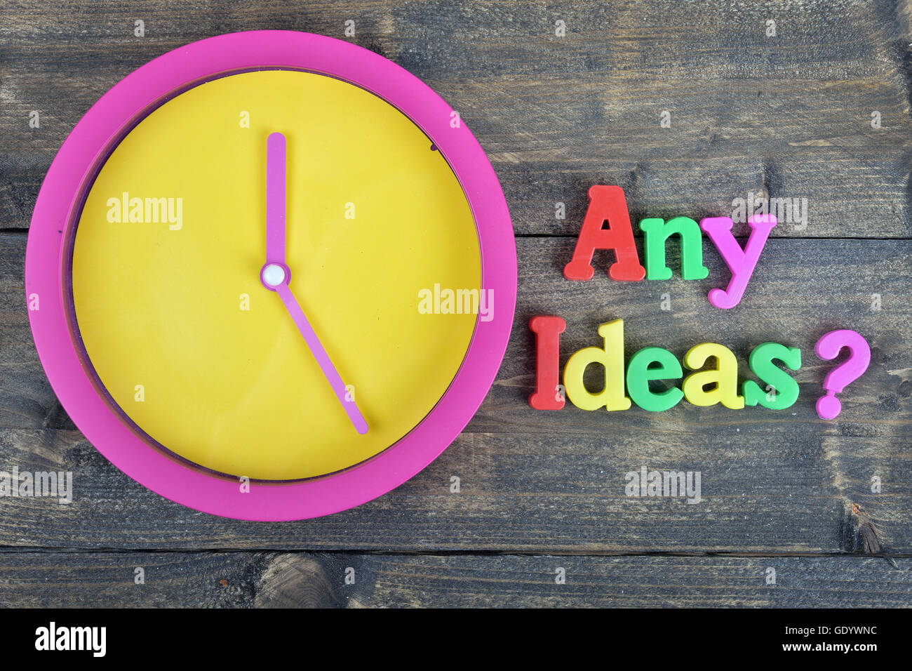 Any ideas ? question on wooden table Stock Photo - Alamy