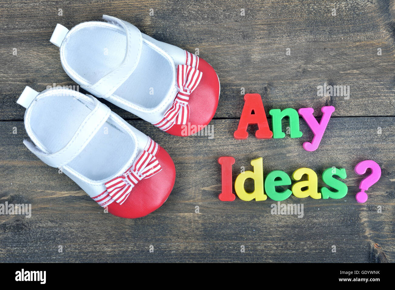Any ideas ? question on wooden table Stock Photo - Alamy