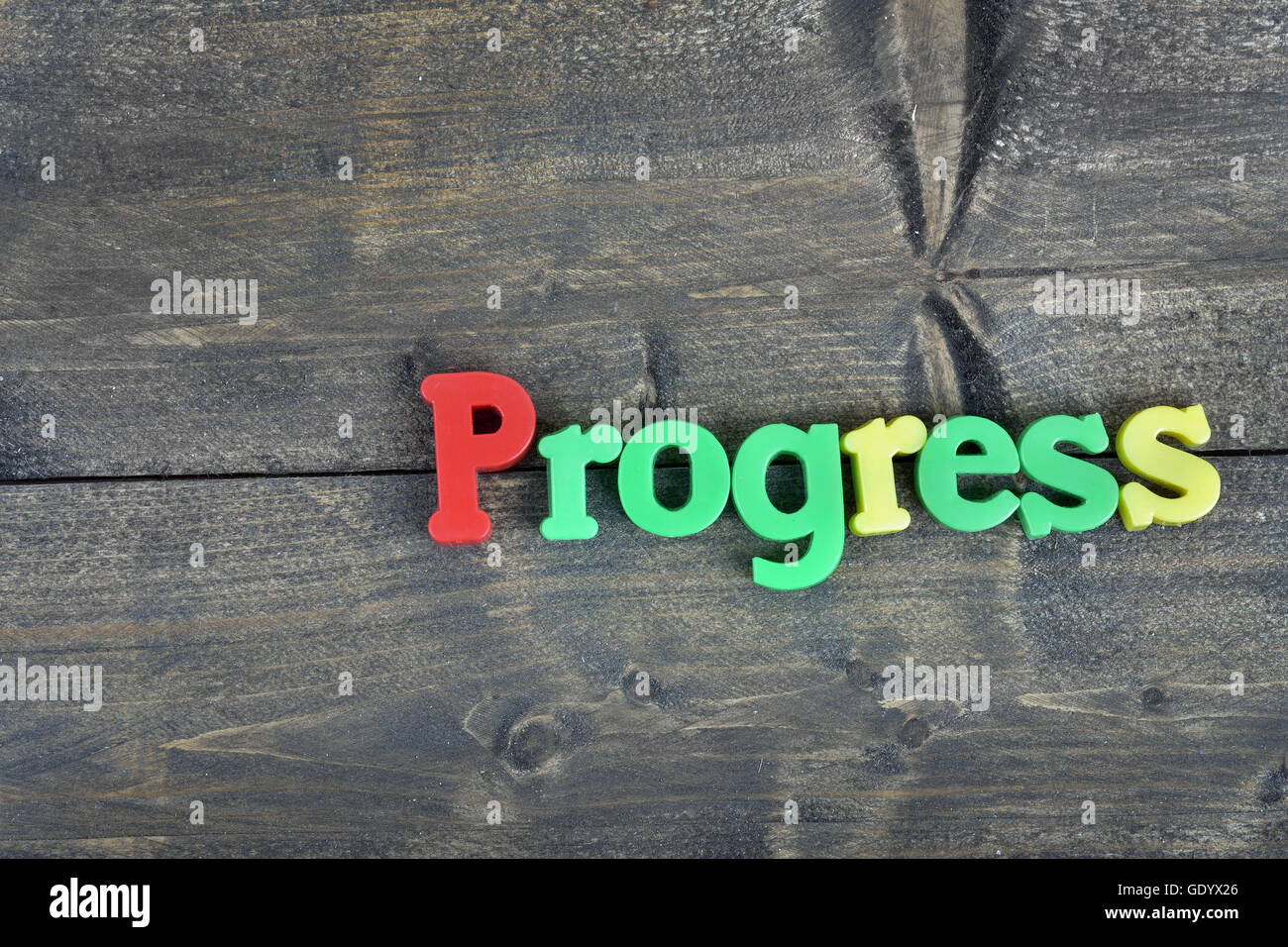 Progress word on wooden table Stock Photo - Alamy