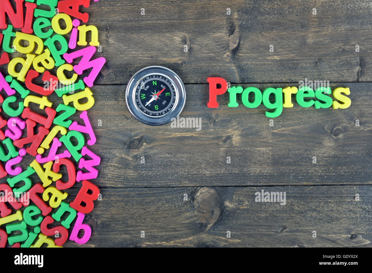 Progress word on wooden table Stock Photo - Alamy