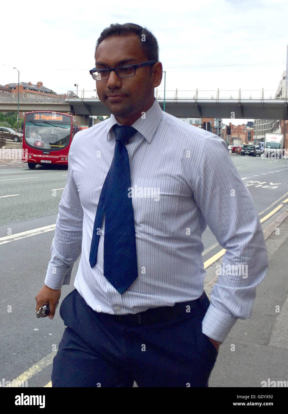 Barrister Sanjay Roy leaves Nottingham Crown Court after being given a ...