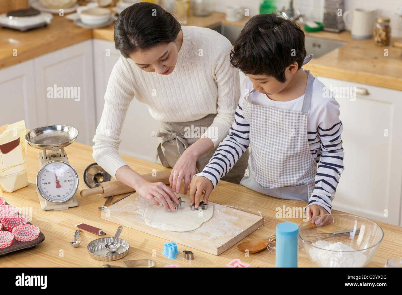 Mother son making cookies hi-res stock photography and images - Alamy