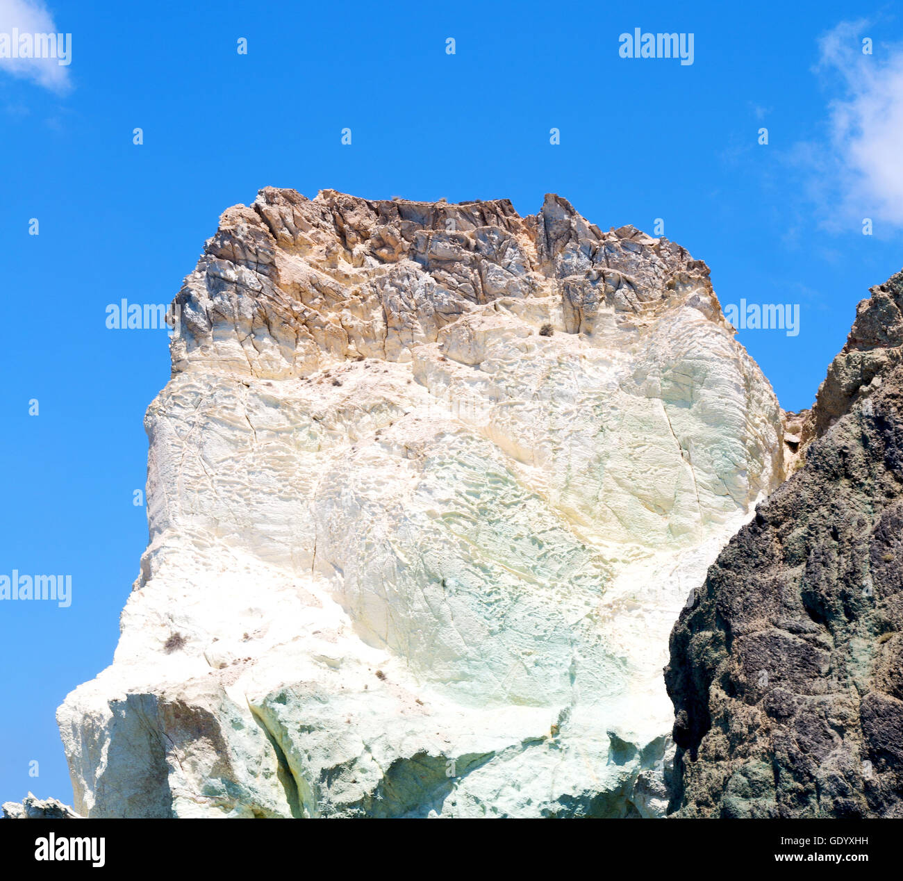 santorini europe greece and dry bush rock alone in the sky Stock Photo ...