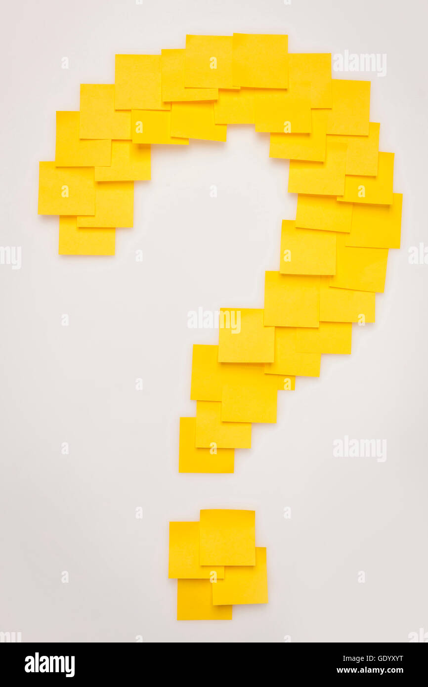 Question mark made of yellow post-it Stock Photo - Alamy