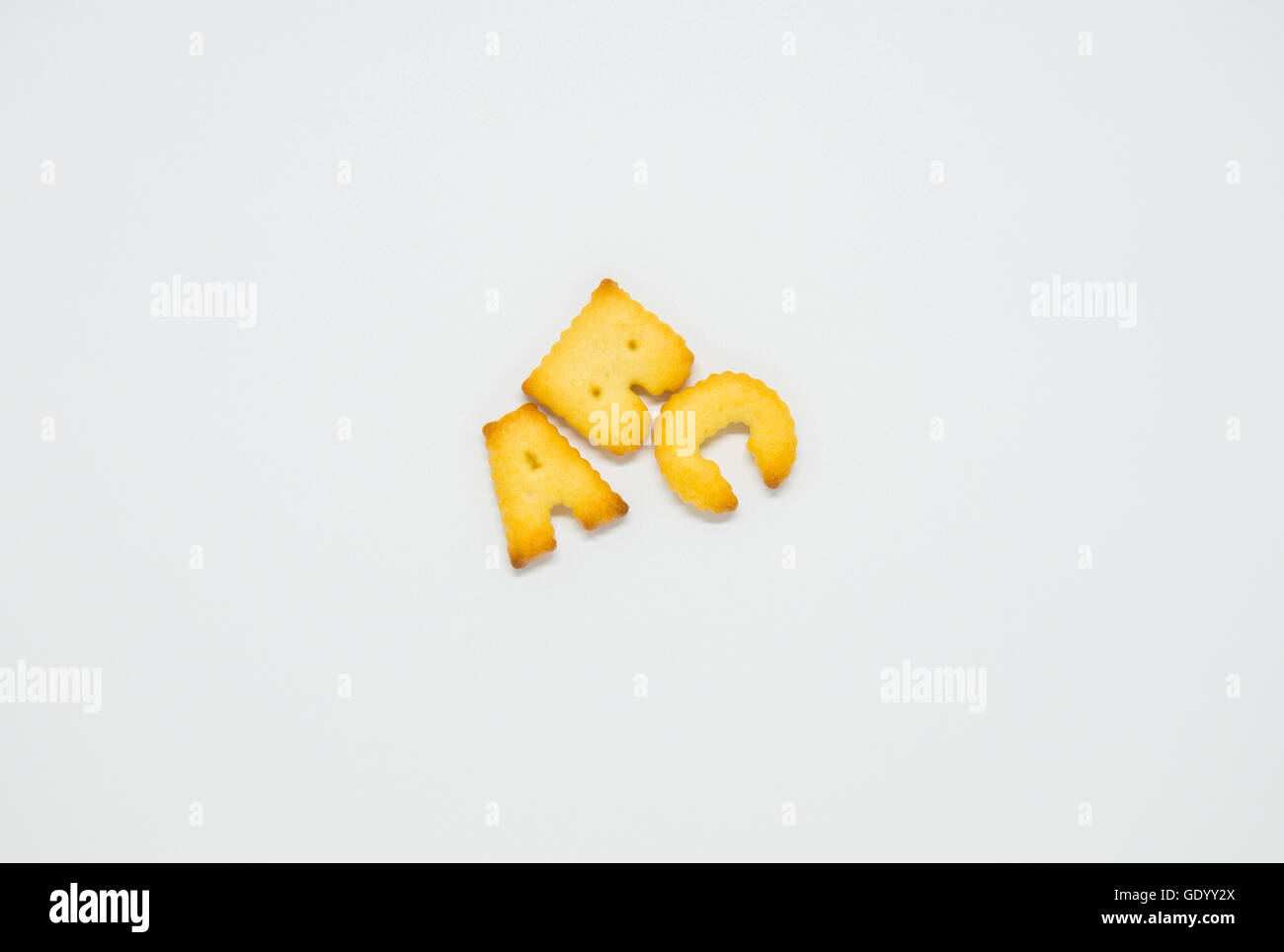 ABC alphabet cracker on white background Stock Photo - Alamy