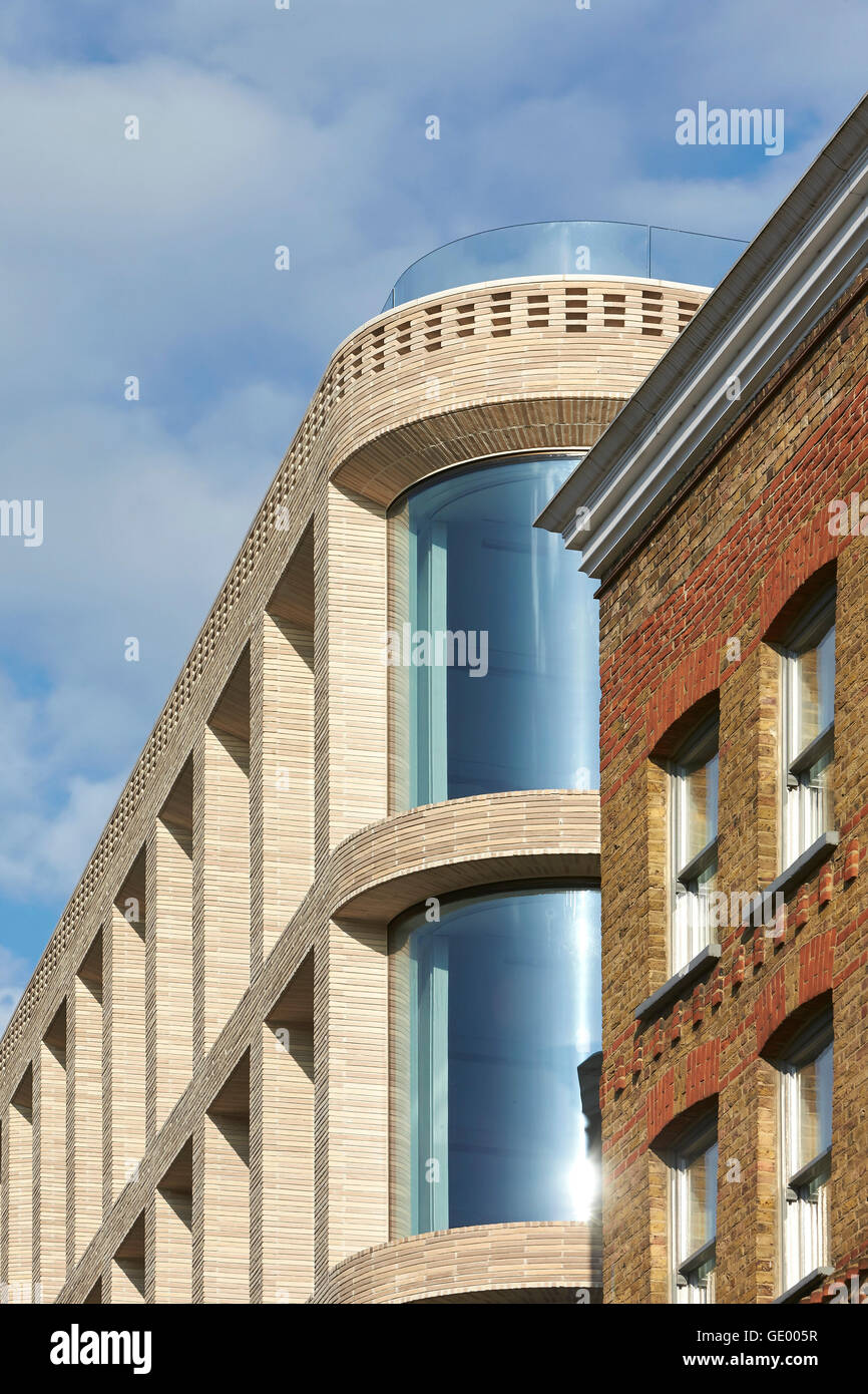 Juxtaposition of facades. Turnmill Building, London, United Kingdom ...