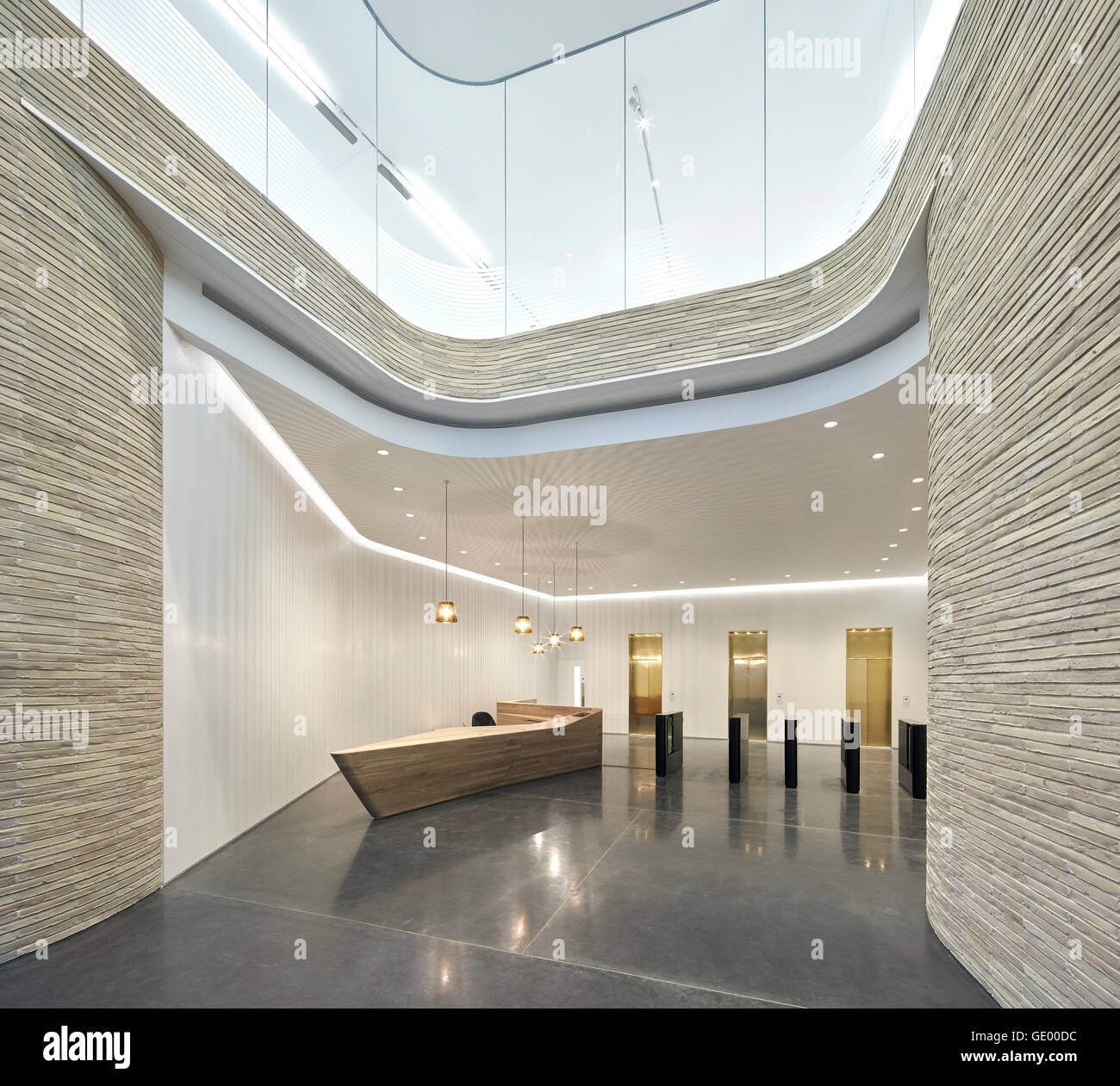 Entrance atrium with view to reception. Turnmill Building, London Stock ...