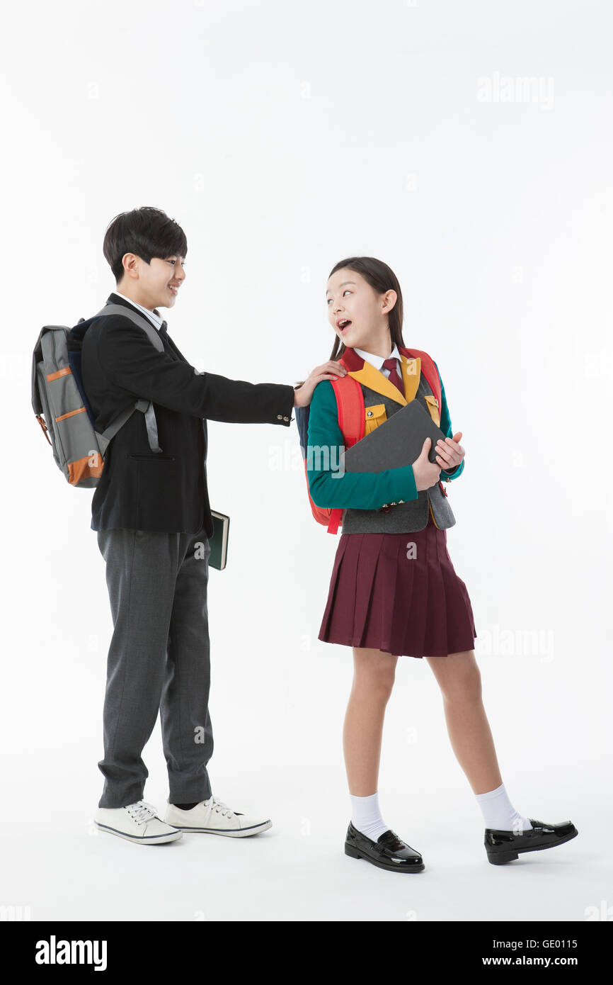 Walking boy and girl hi-res stock photography and images - Alamy