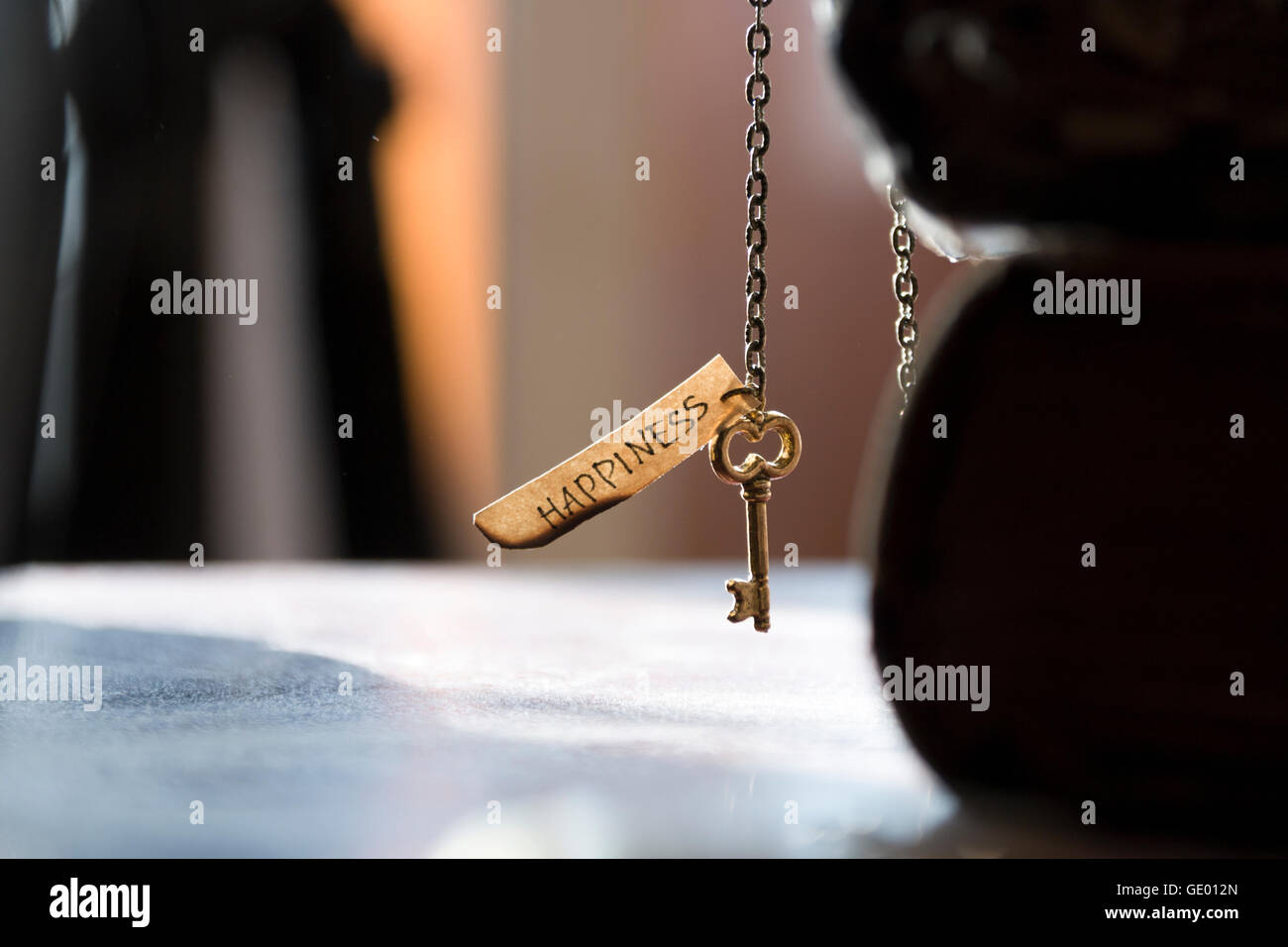 religion concept, the Bible and the key to happiness Stock Photo - Alamy