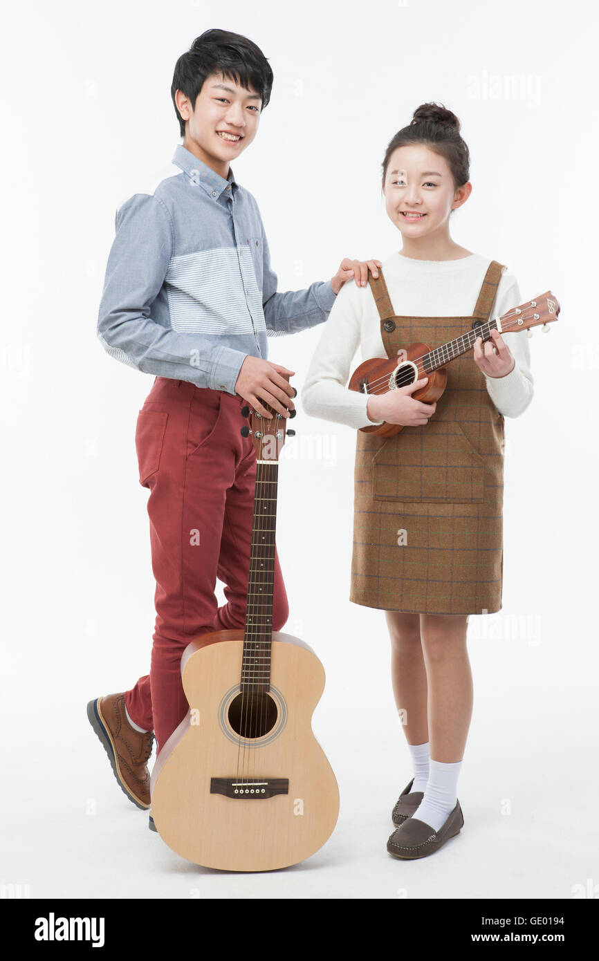 Boy With Musical Instruments High Resolution Stock Photography and ...
