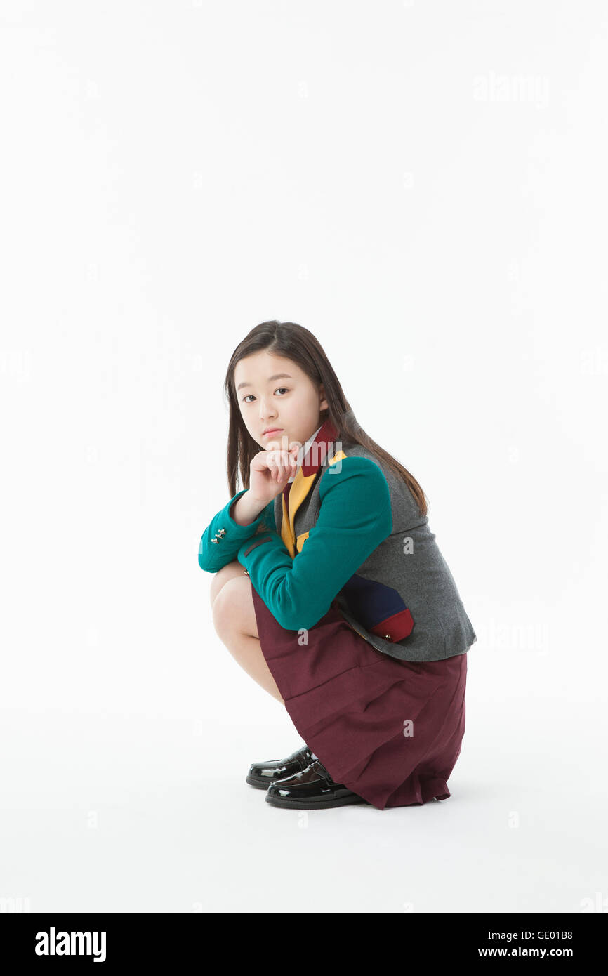 School girl sitting hi-res stock photography and images - Alamy