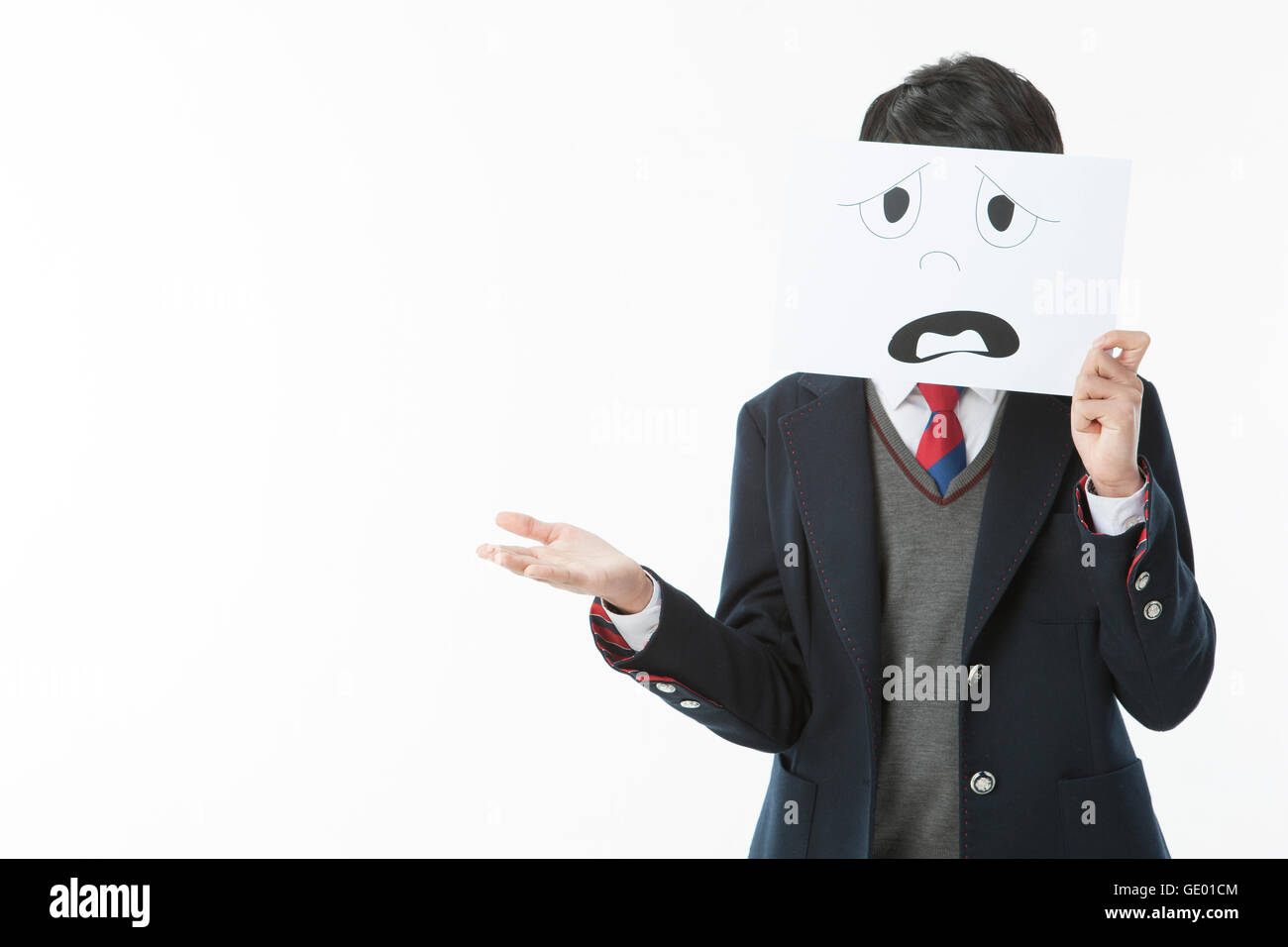 Portrait of middle school boy with an embarrassed mask Stock Photo - Alamy