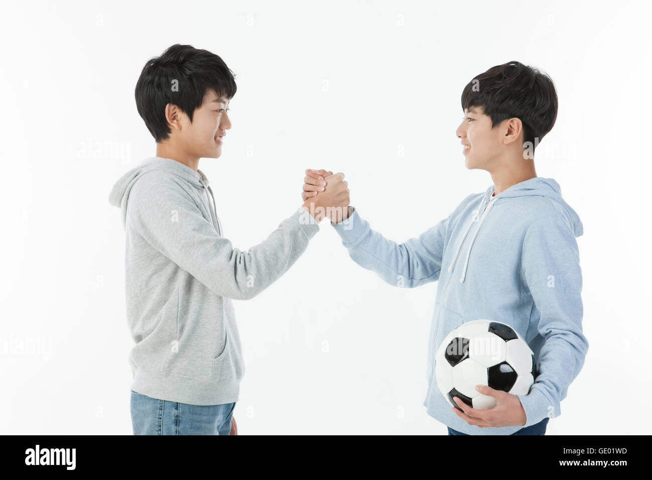 Boys holding hi-res stock photography and images - Alamy