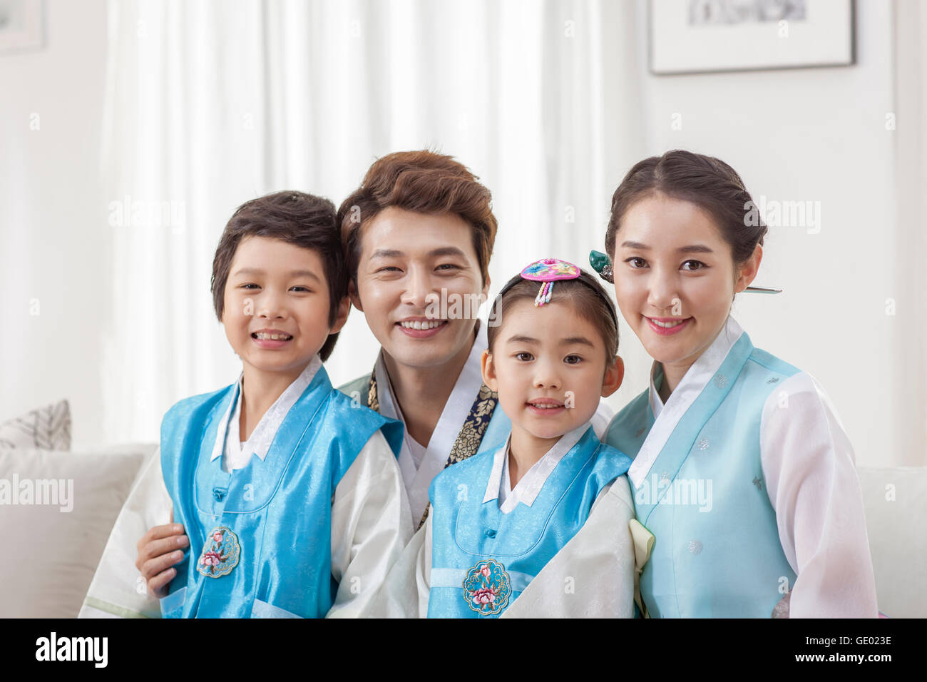 Portrait of smiling Korean family in traditional Korean clothes Stock ...