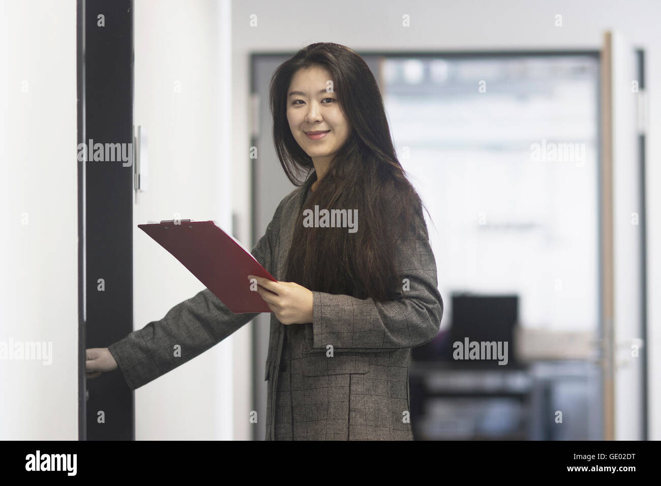 Young female engineer working in an industrial plant, Freiburg im ...