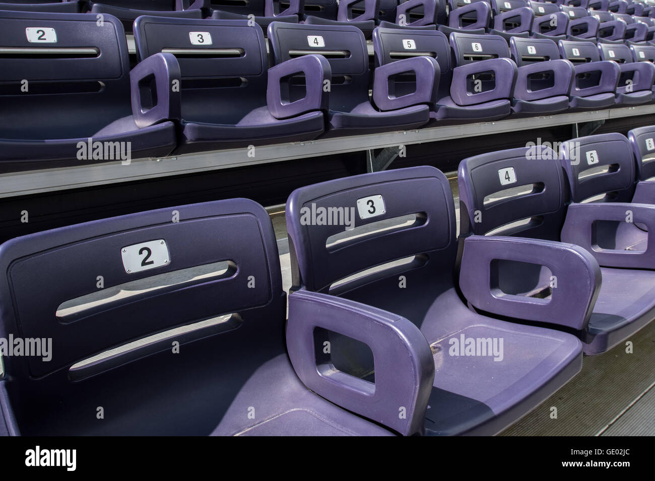 Purple Stadium Seats Tight High Angle on a diagonal Stock Photo - Alamy