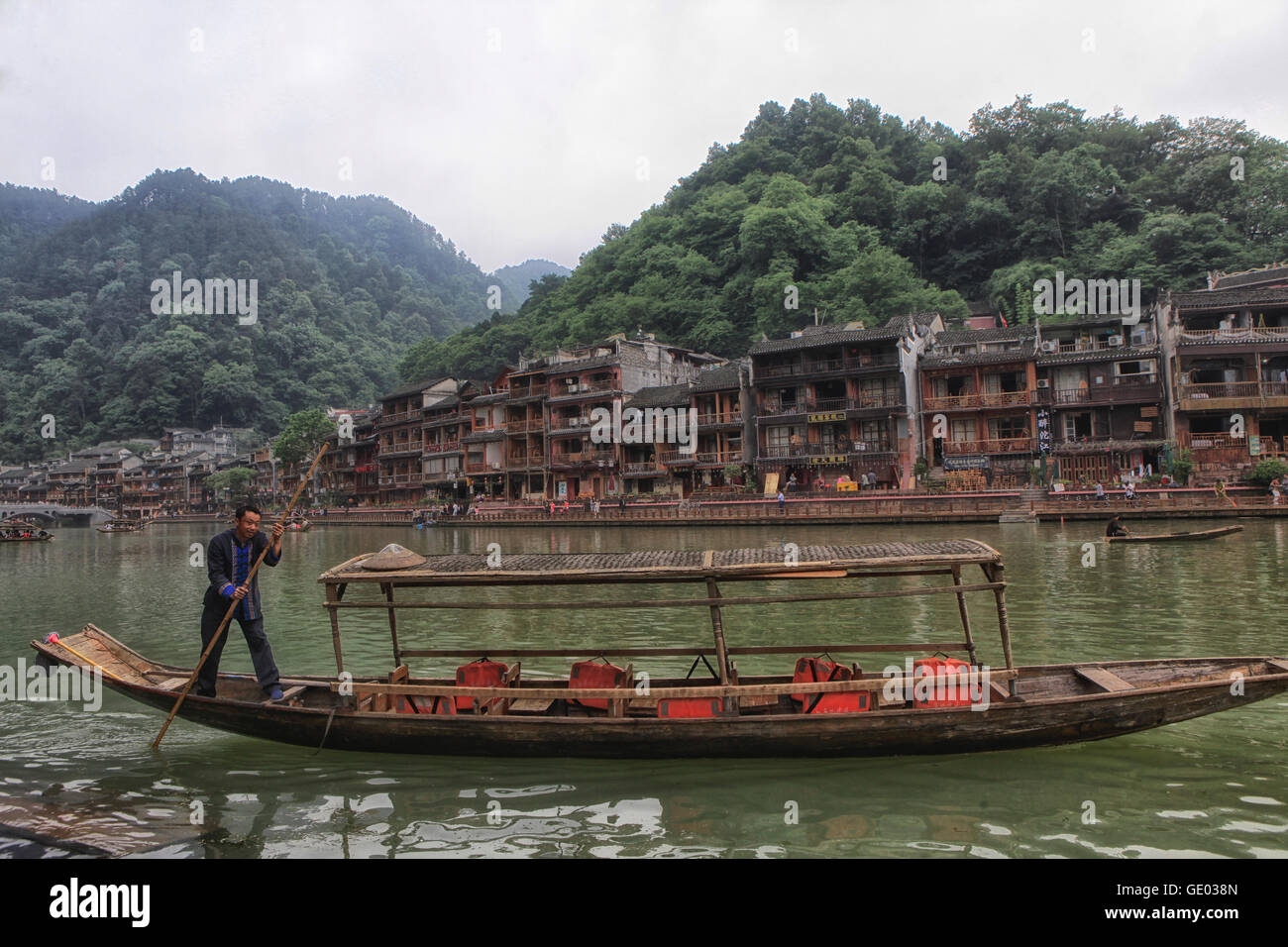 Old man driving boat hi-res stock photography and images - Alamy