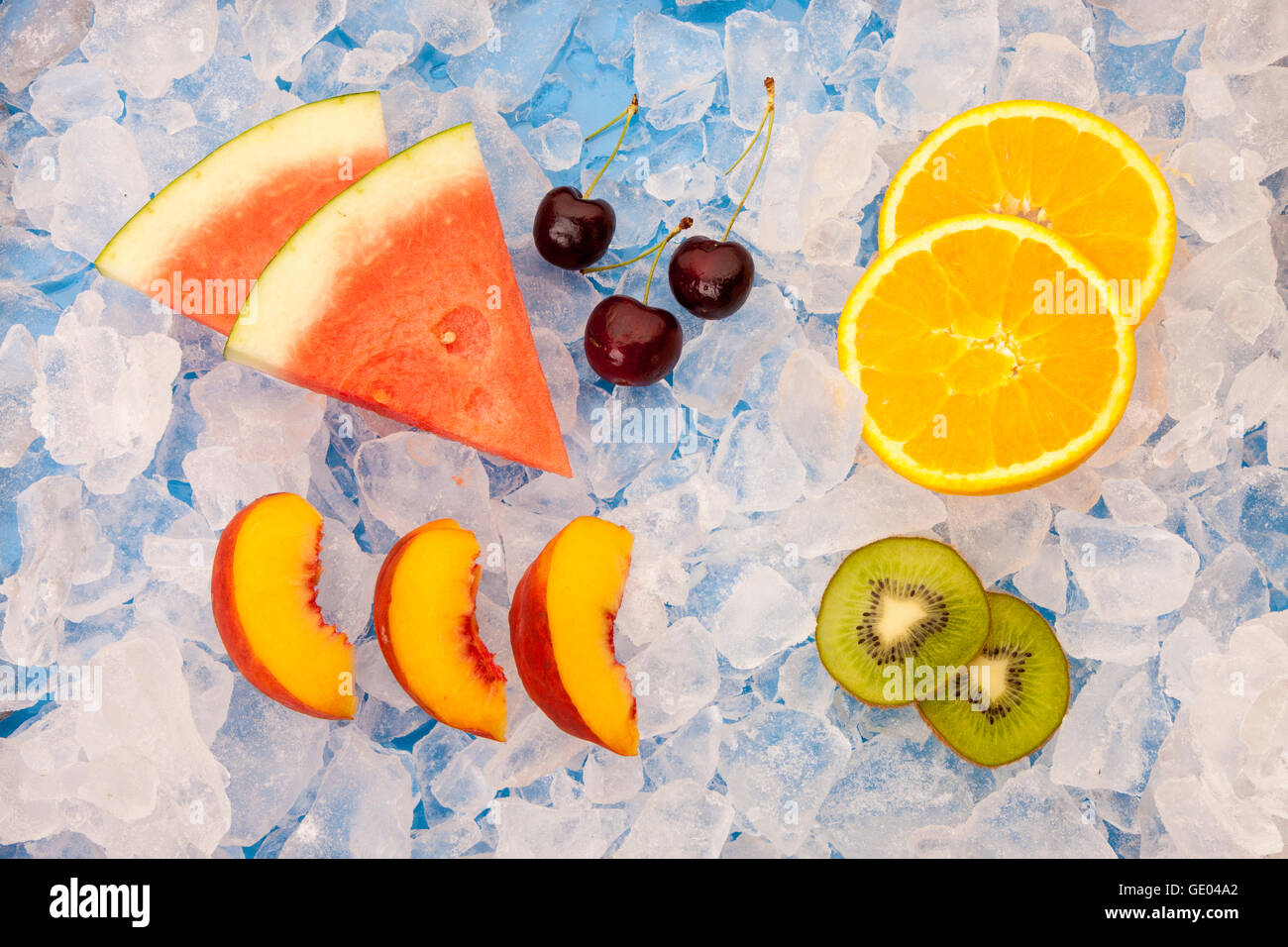 Assorted fruit on ice Stock Photo - Alamy