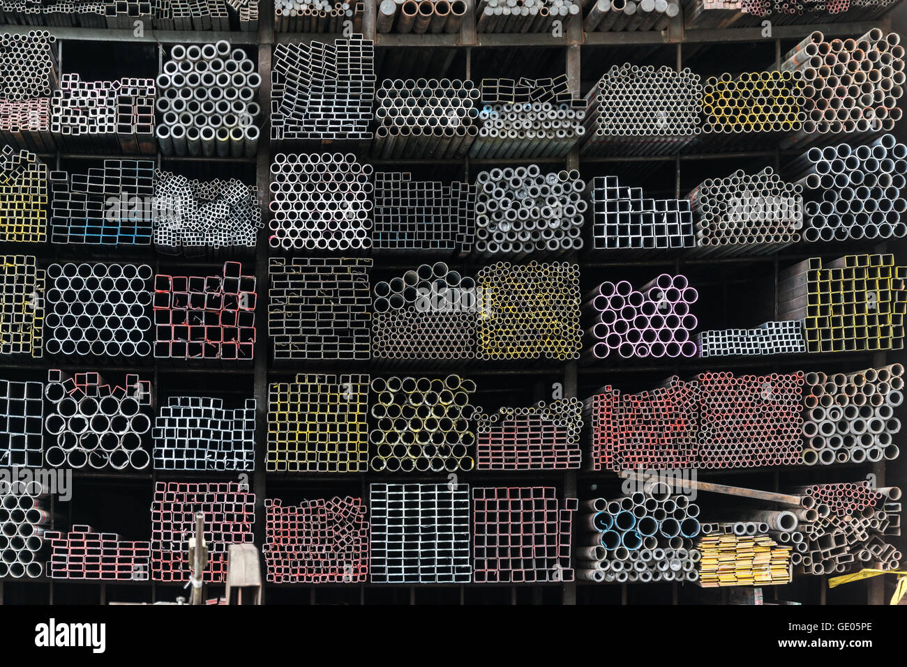 iron pipes shelf in warehouse Stock Photo - Alamy