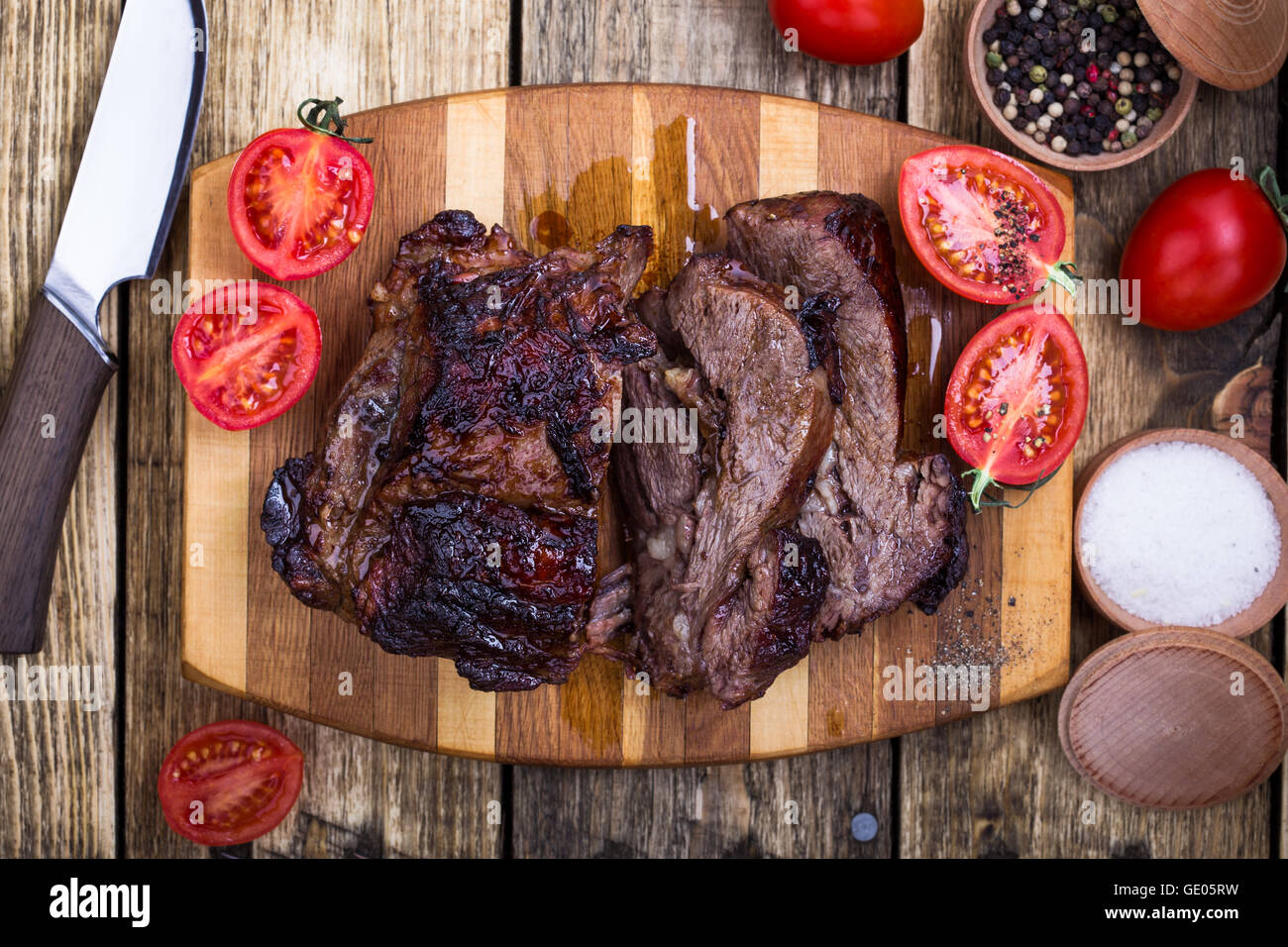 Homemade roasted beef shoulder on a wooden board ready to eat, top view ...
