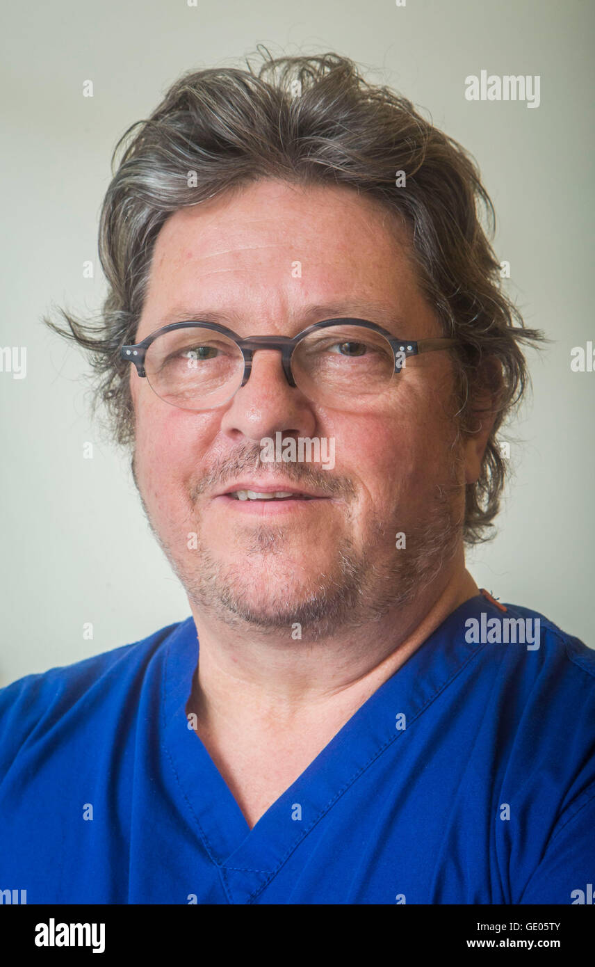 Consultant Plastic Surgeon Professor Simon Kay who performed the UK's ...