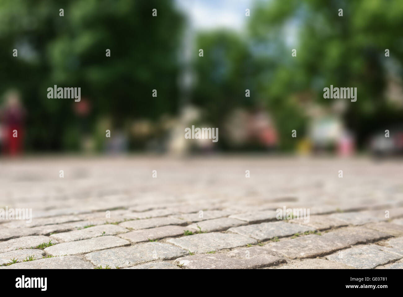 perspective view of old paved square in town Stock Photo - Alamy