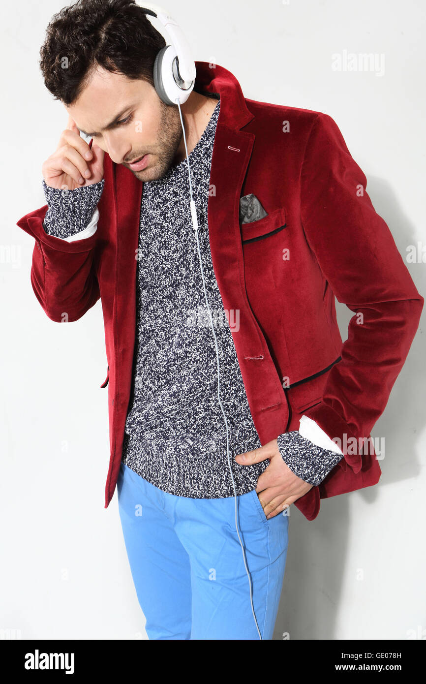 Handsome man listening to music Stock Photo - Alamy
