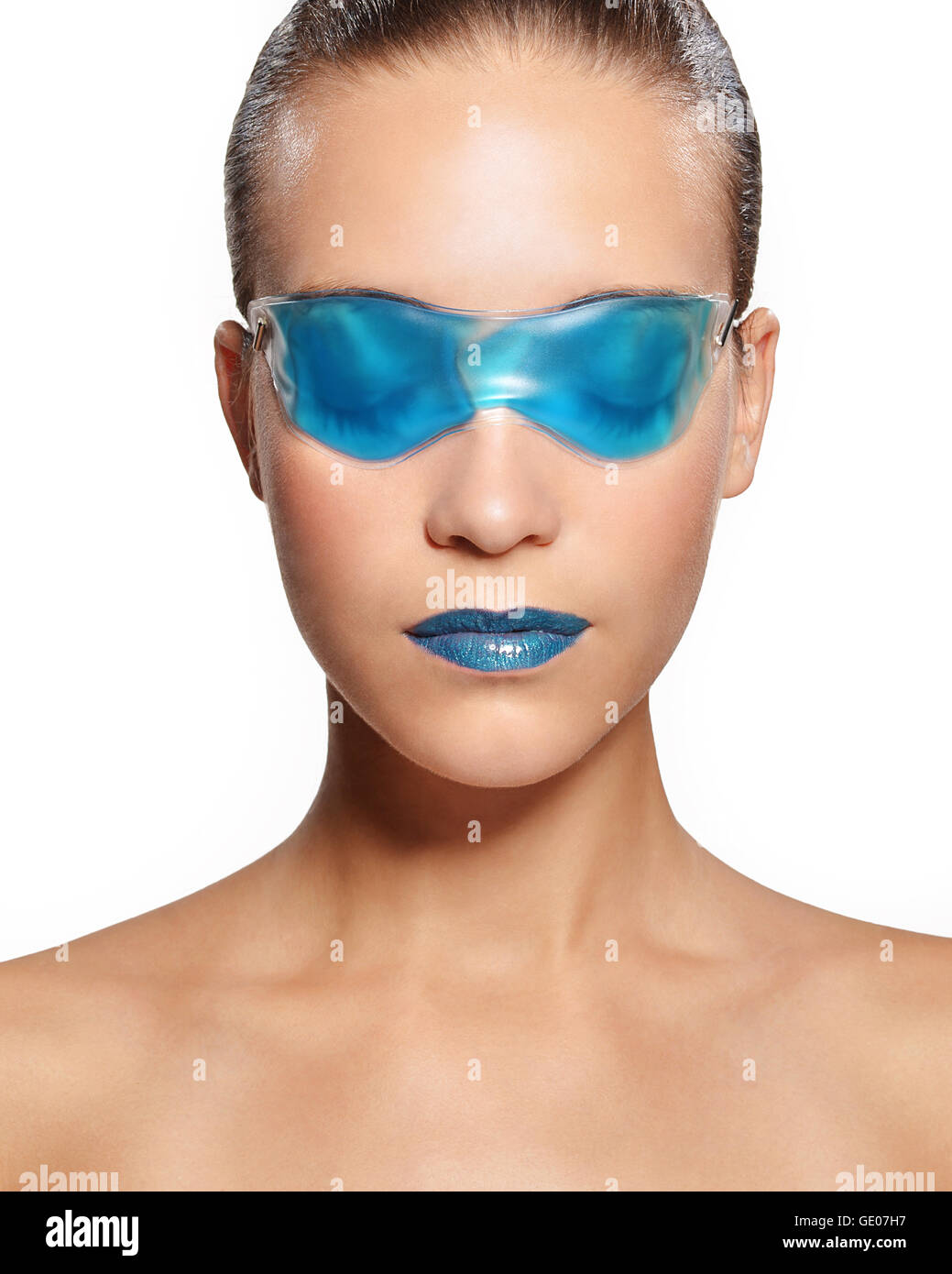 Young woman resting with a mask over her eyes Stock Photo - Alamy