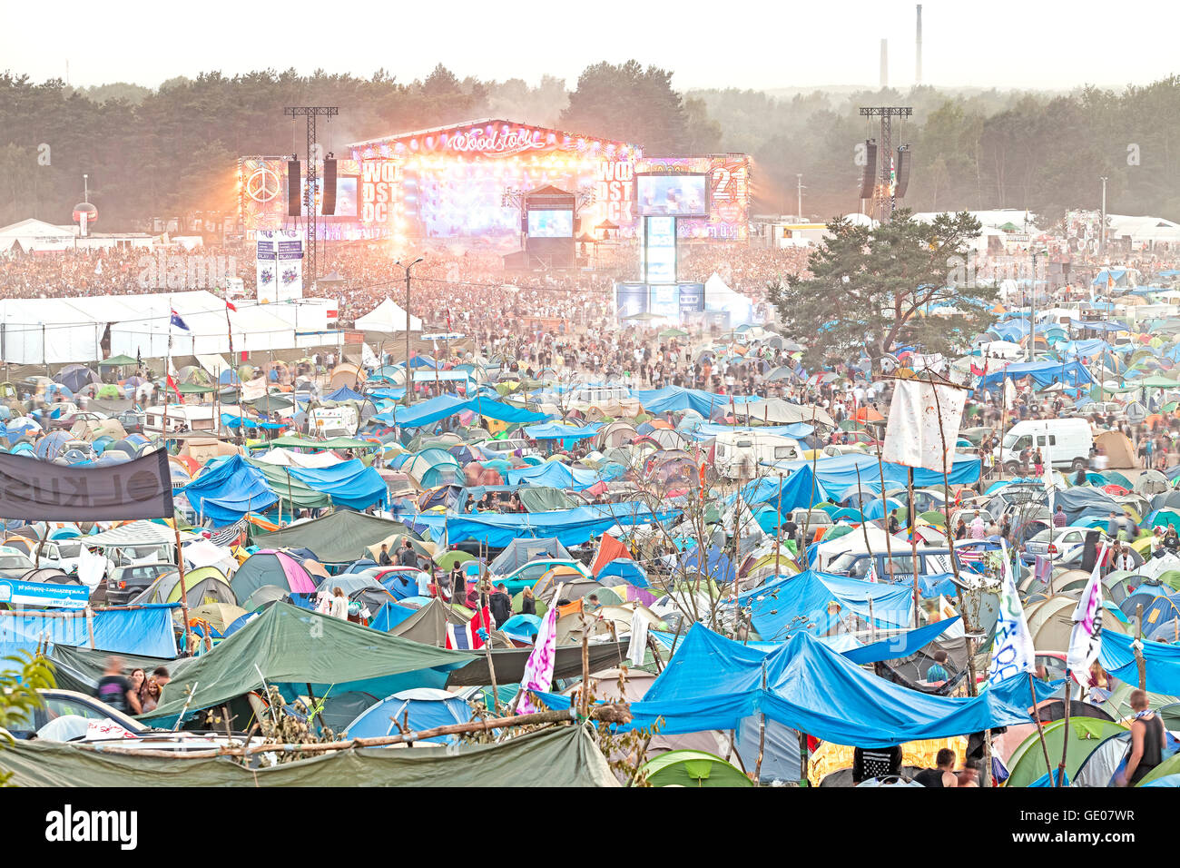 Evening view of concert on main stage and tents at the 21th Woodstock ...
