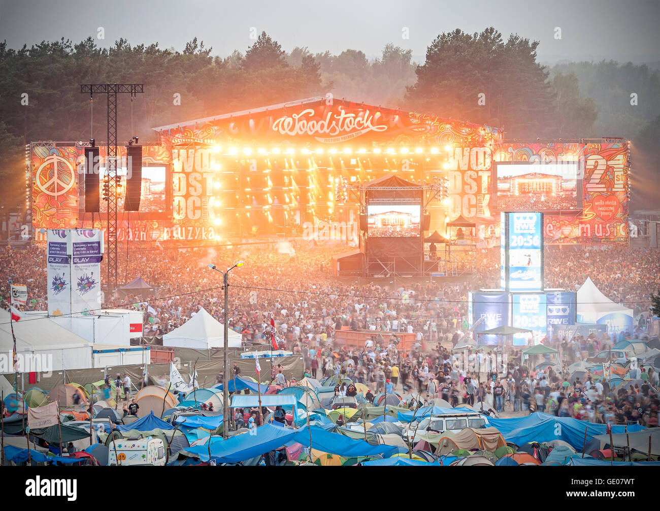 Evening view of concert on main stage and tents at the 21th Woodstock ...