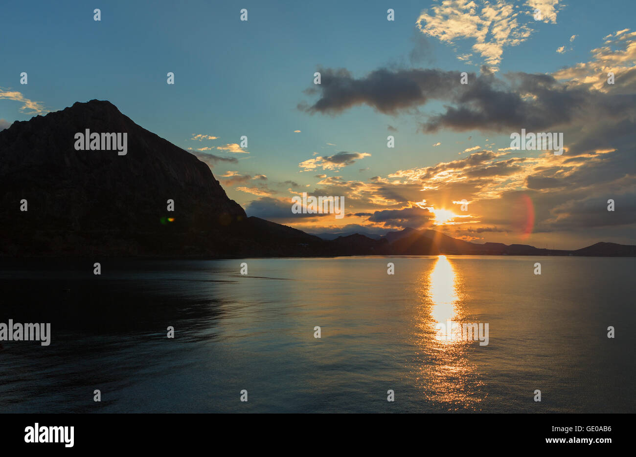 Beautiful sunrise in the Blue Bay near village Novyi Svit. Crimea Stock ...