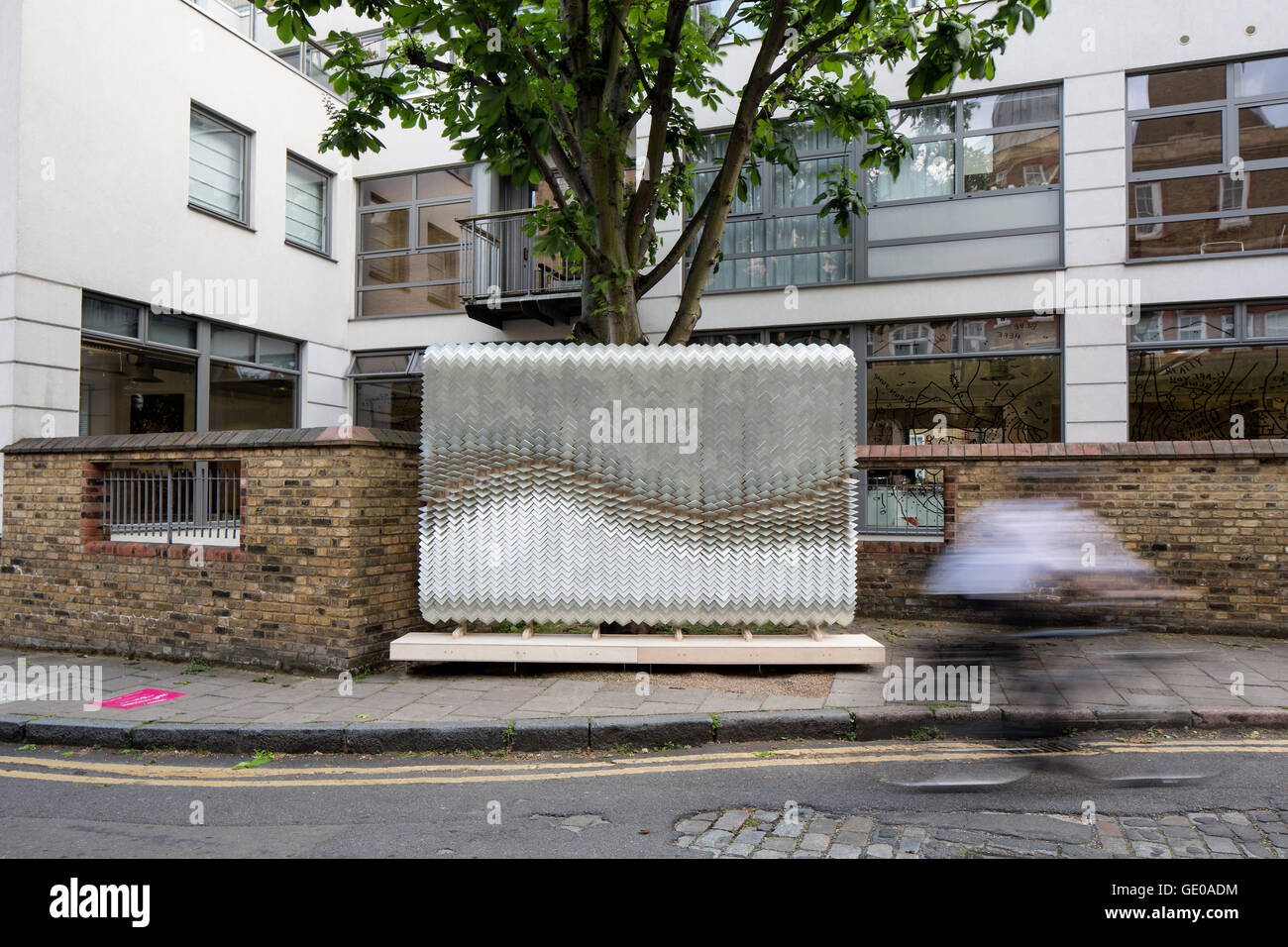 Wide view of silver tiles billboard. Wayfinding sculptures Clerkenwell ...