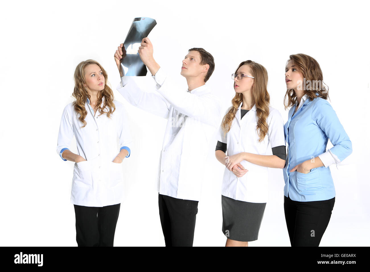 Team of young surgeons watching picture of bone fractures Stock Photo ...