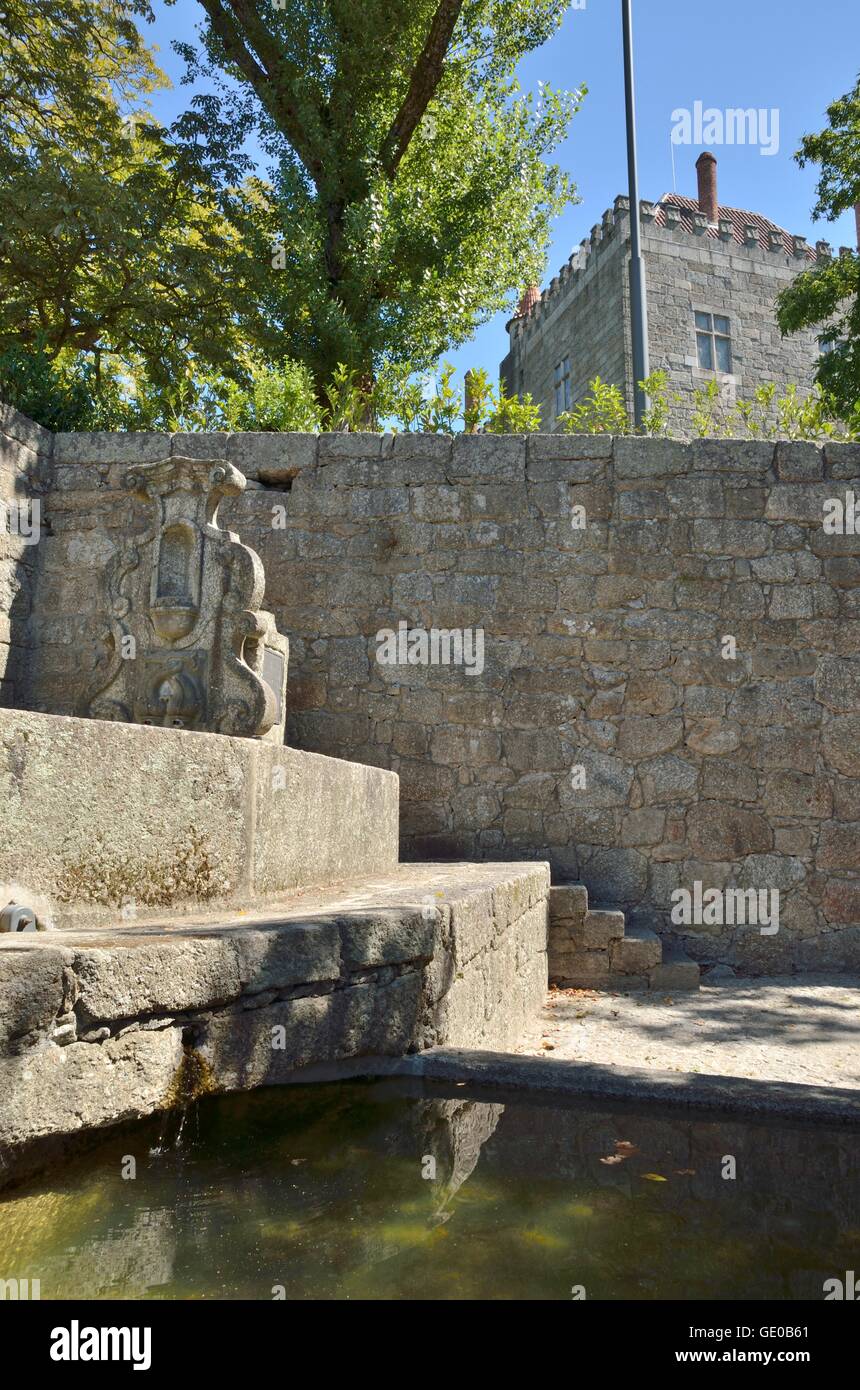 Medieval fountain on wall in front of the Palace of the Dukes of ...