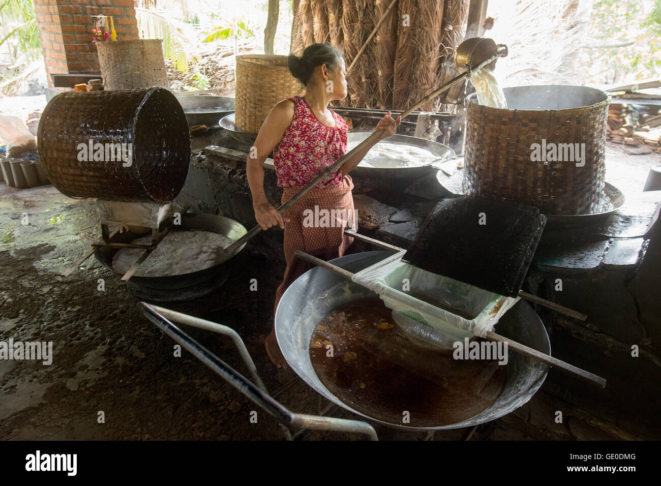 The Palm sugar production at a Plantation in the Town of Tha Kha in the ...