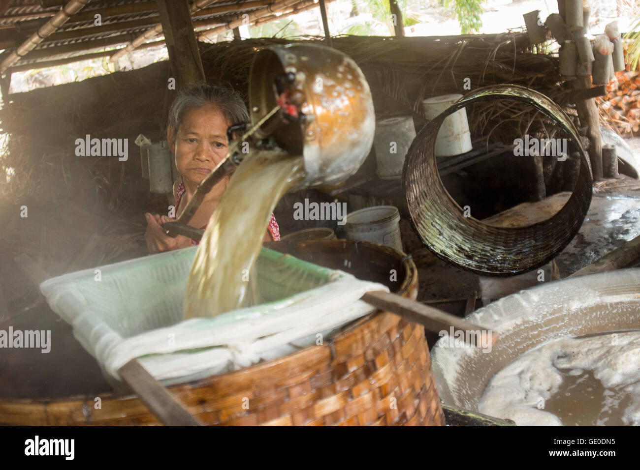 The Palm sugar production at a Plantation in the Town of Tha Kha in the ...