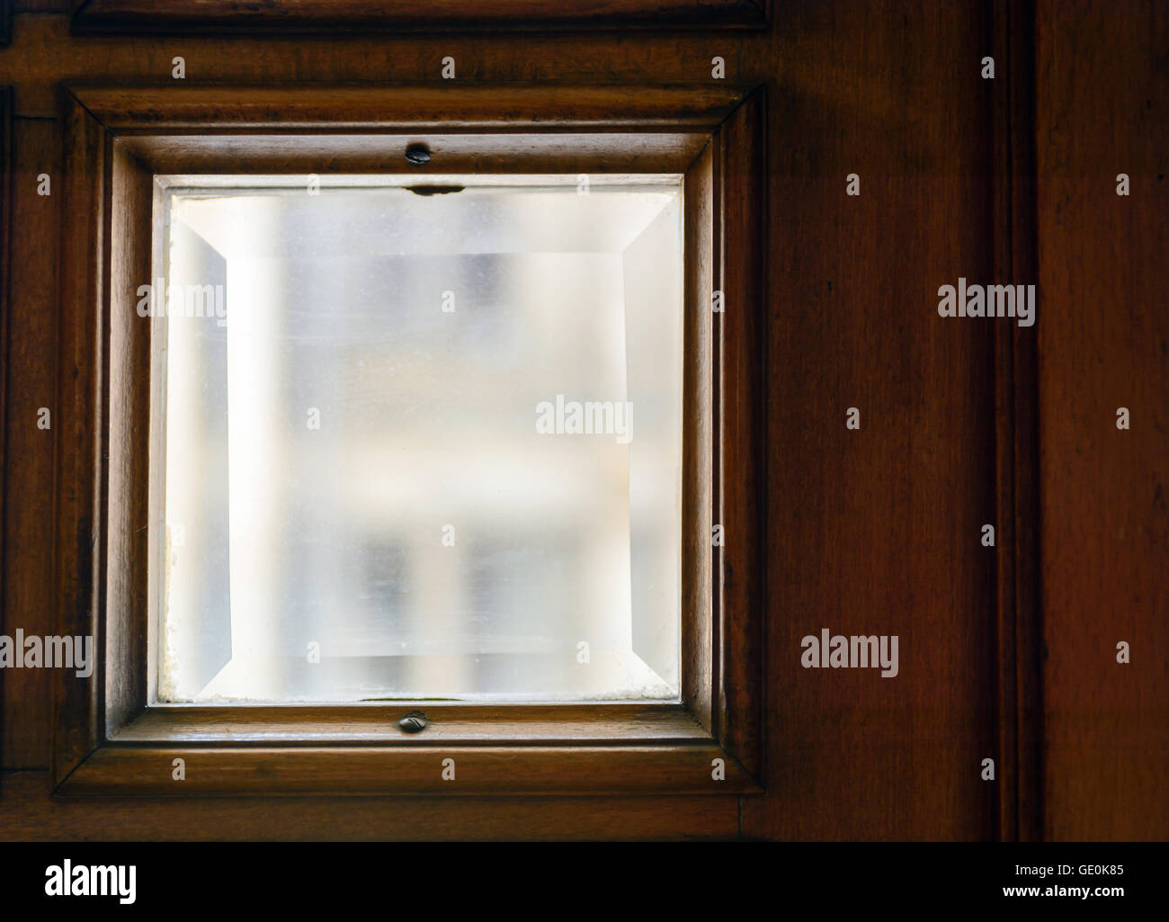 square windows in the door. Glass with bevel Stock Photo - Alamy