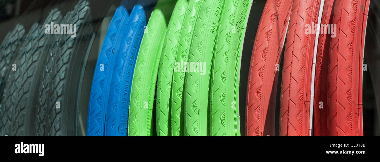 New bicycle tires with different color tread close-up Stock Photo - Alamy