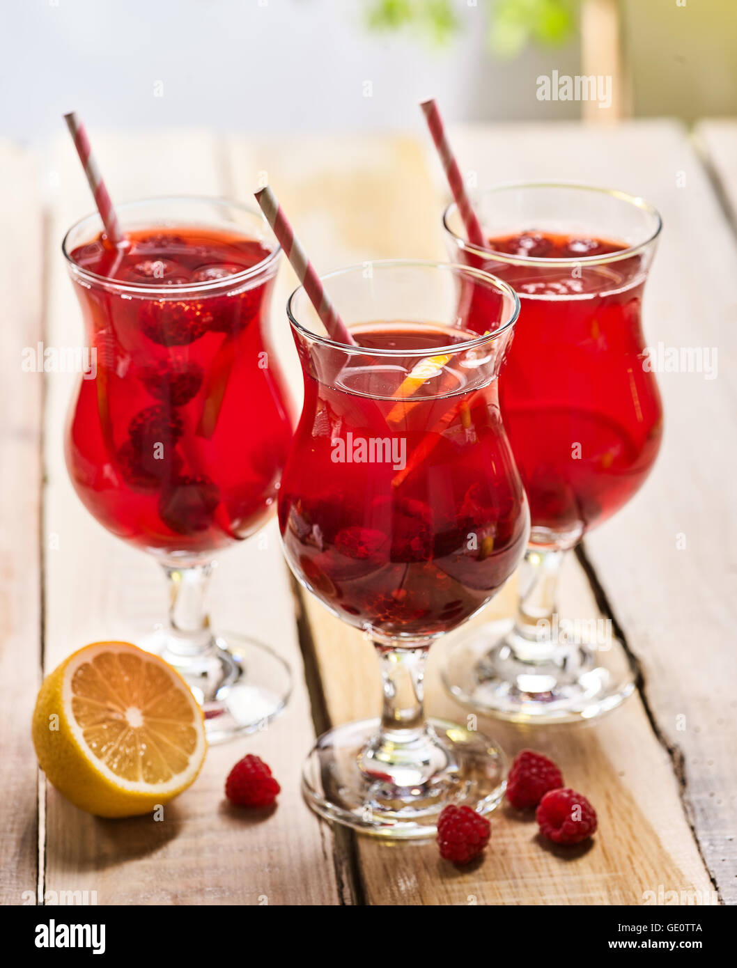 On wooden is ice cold beverage glass with berries cocktail Stock Photo ...