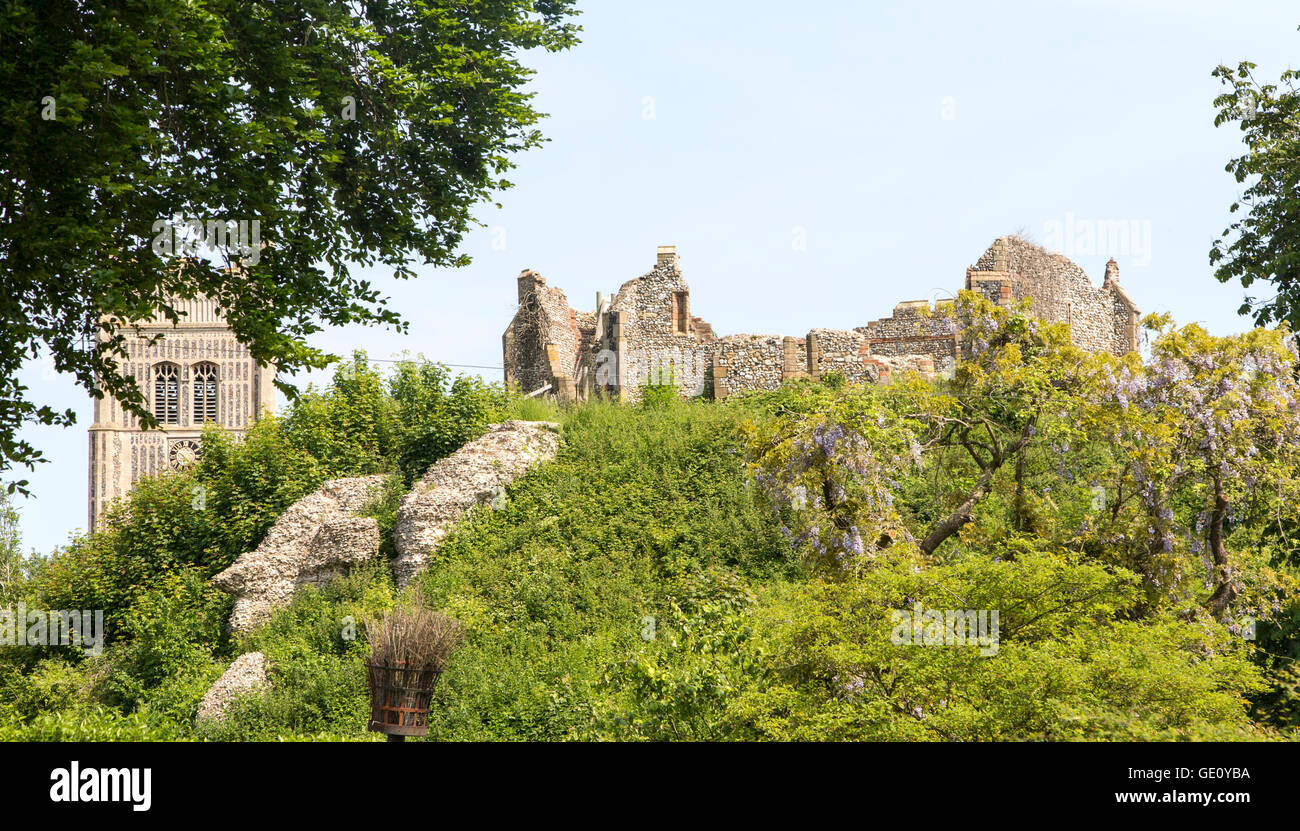 Norman motte and bailey castle with Victorian building ruin Eye ...