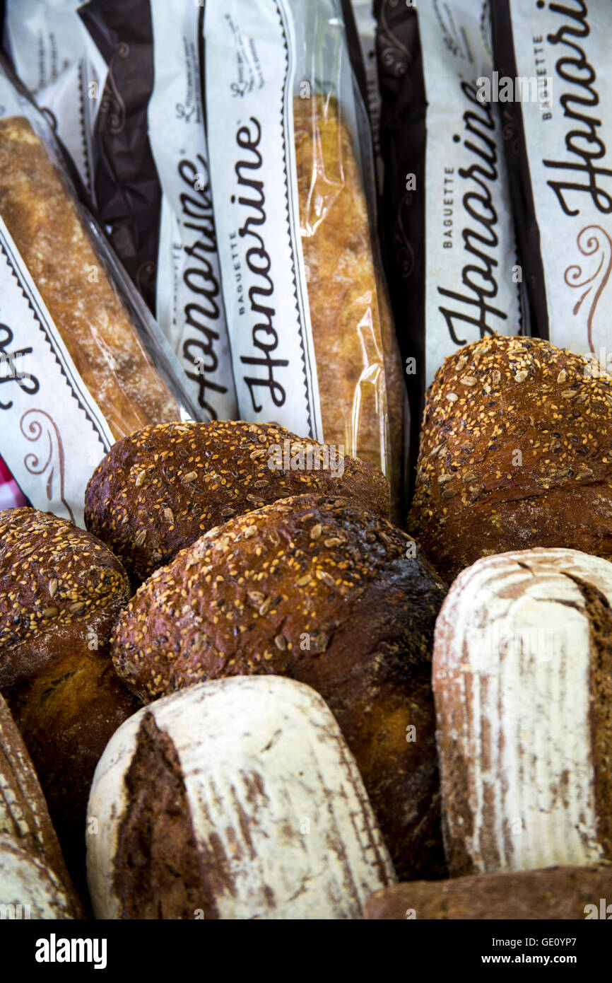 An assortment of bread loaves await purchase Stock Photo - Alamy