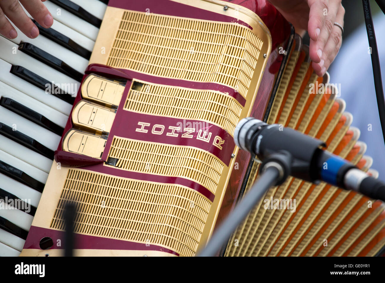 An accordion being played in concert Stock Photo - Alamy