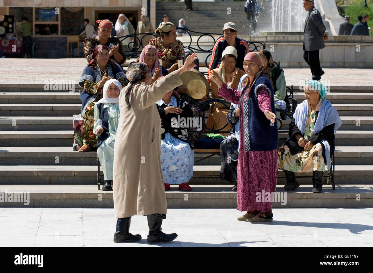 Uzbek woman having fun and dancing, Samarkand, Uzbekistan Stock Photo ...