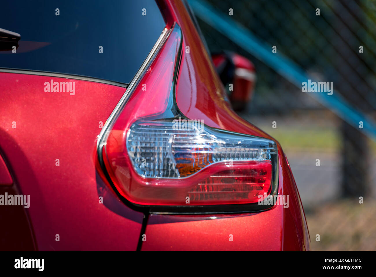 Back light of city car on the street background Stock Photo - Alamy