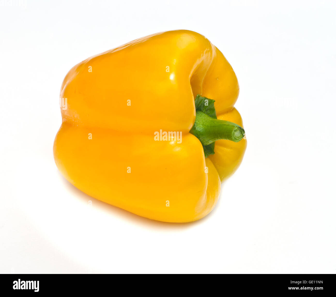 fresh sweet yellow paprika ( pepper ) isolated on white background ...
